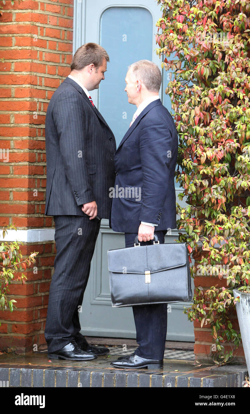 Police officers at Andy Coulson's house in South London. Mr Coulson ...