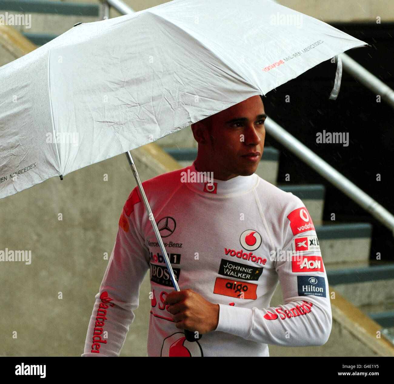 McLaren Mercedes' Lewis Hamilton in the pits as rain delays the Second ...