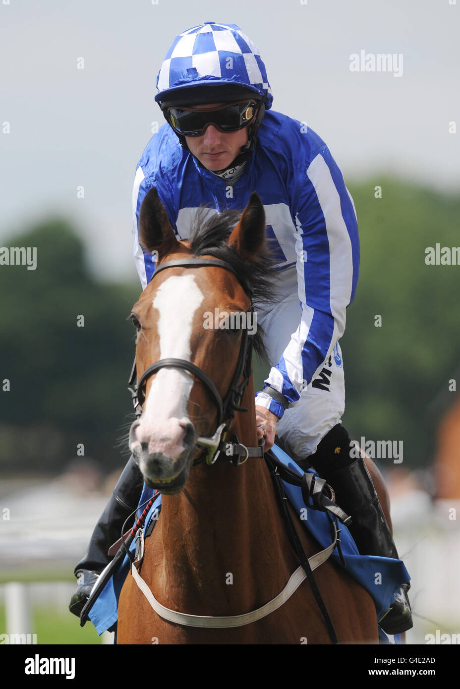 Jockey Paul Hanagan rides Cracking Lass to post before the John Smith's ...