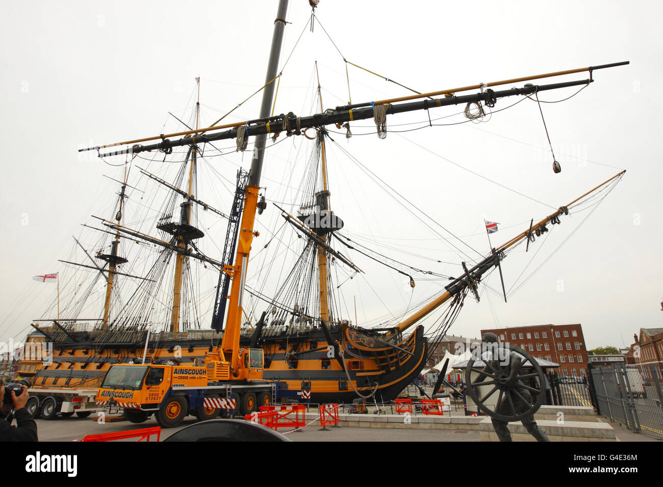 Engineers remove the yard arms from the foremast Admiral Lord Nelson's ...