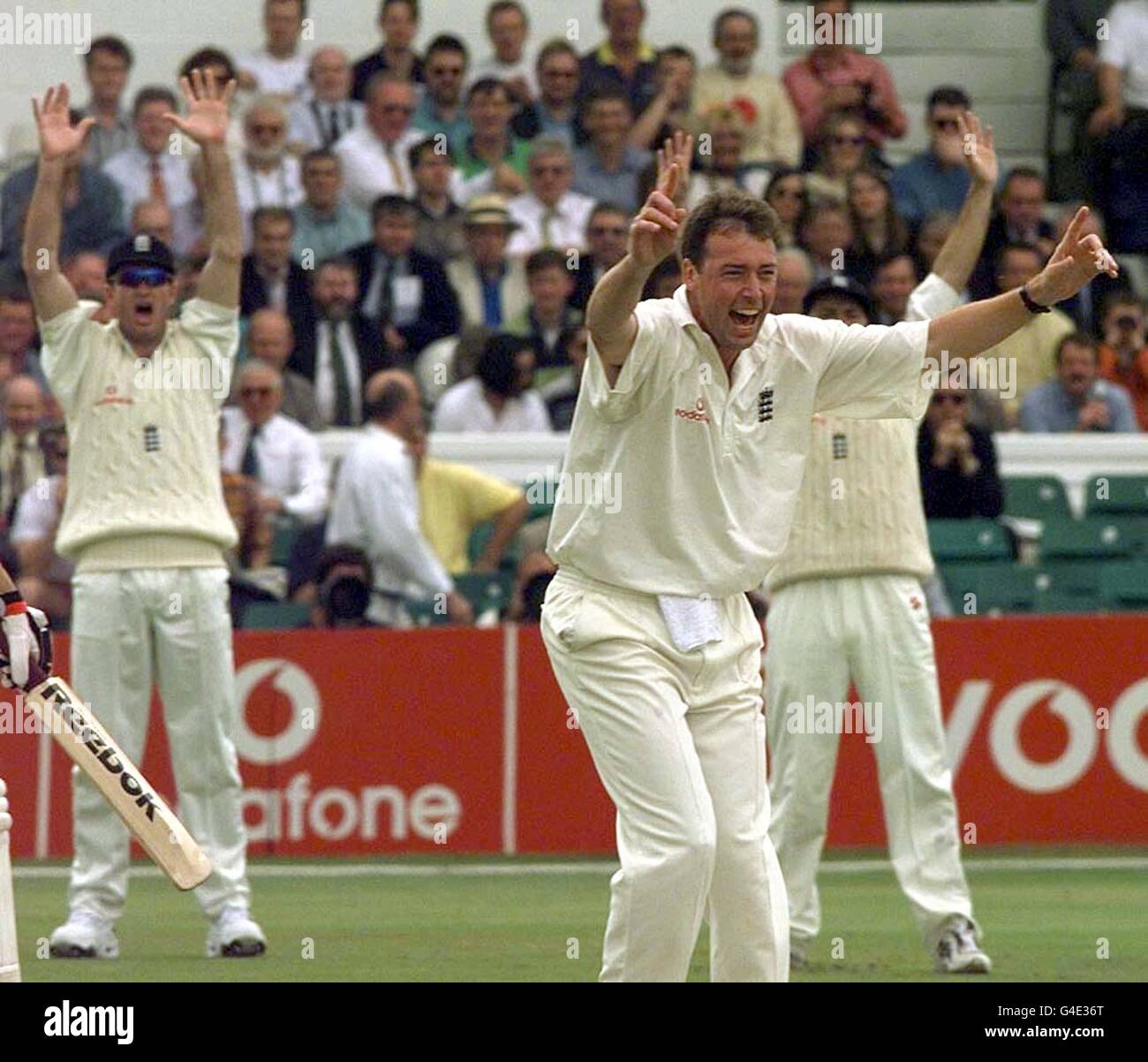 England's Angus Fraser, celebrates an early breakthrough as he claims ...