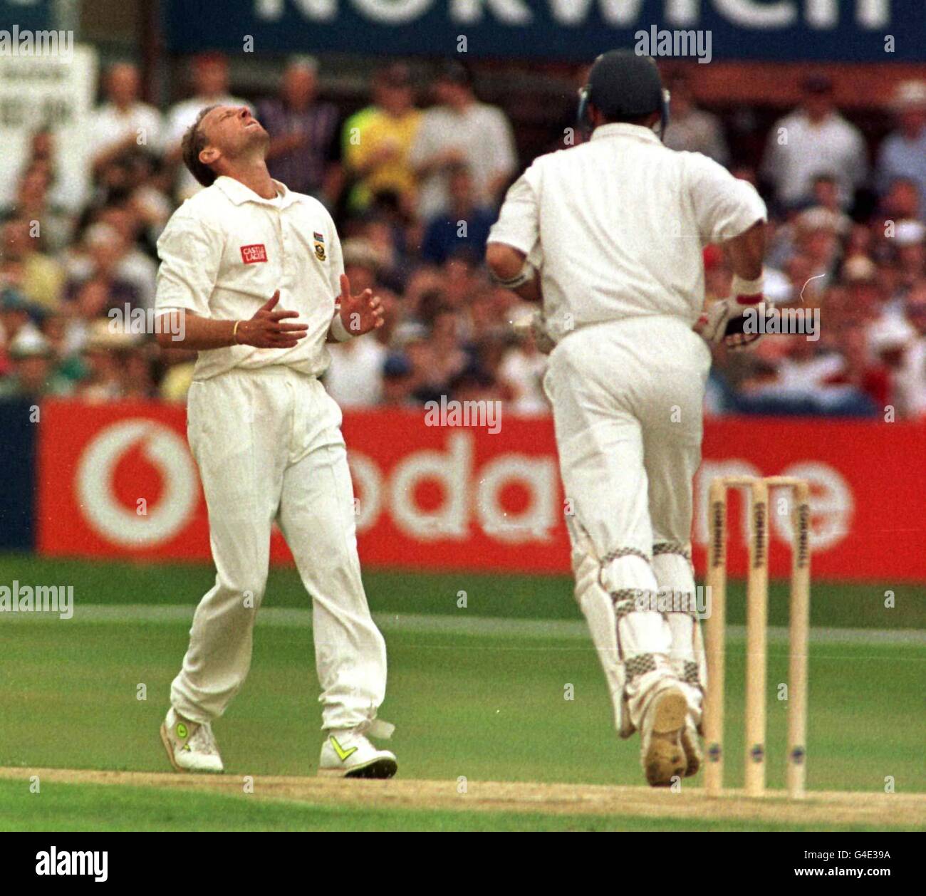South Africa's Alan Donald (left) can't believe it as he delivers a bad ...
