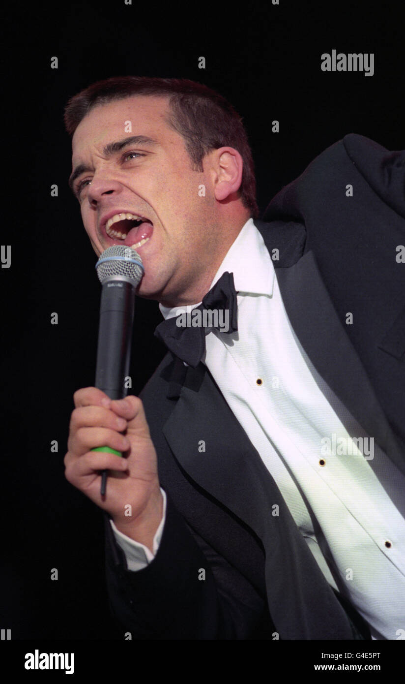 Singer Robbie Williams, performing during the V98 Festival in ...