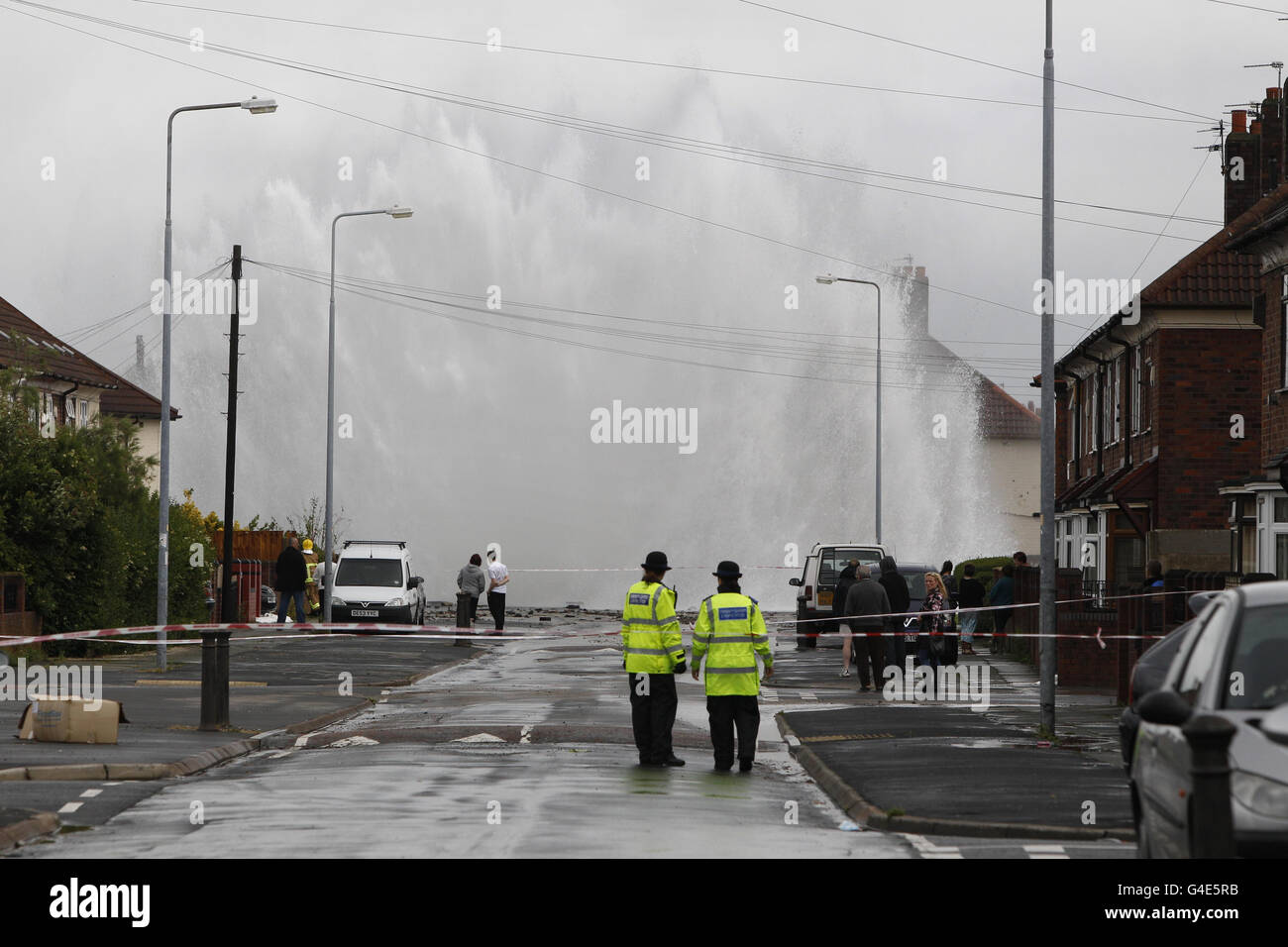 Burst water main Stock Photo - Alamy