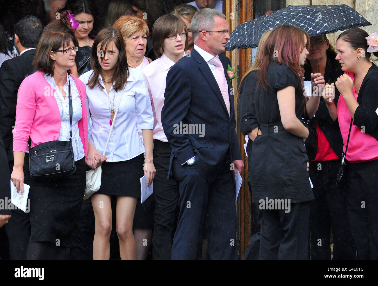 Mourners wear pink funeral becky godden edwards christ church hi-res ...