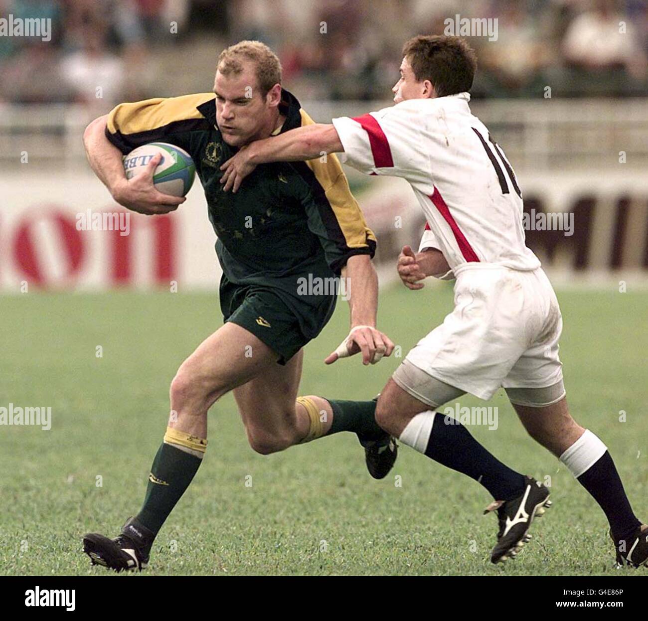 Australia's Cameron Pither and England's Mike Friday in action during ...