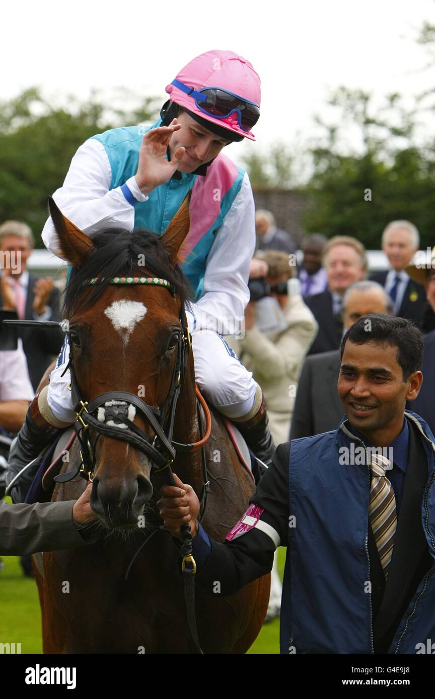 Jockey Tom Queally celebrates after victory on Frankel in the Qipco ...