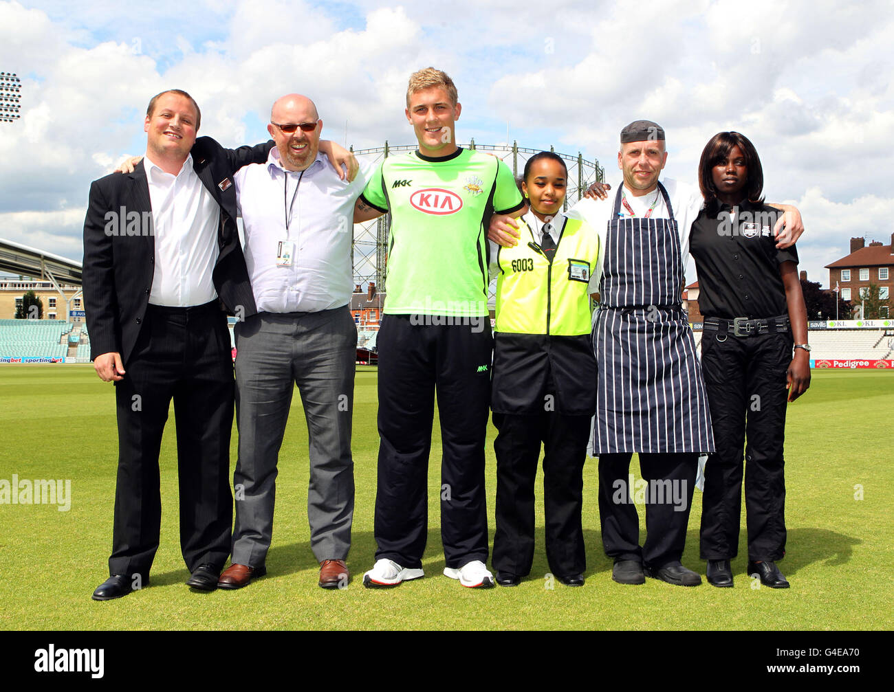Surrey Lions' Rory Hamilton-Brown poses with other members of staff ...