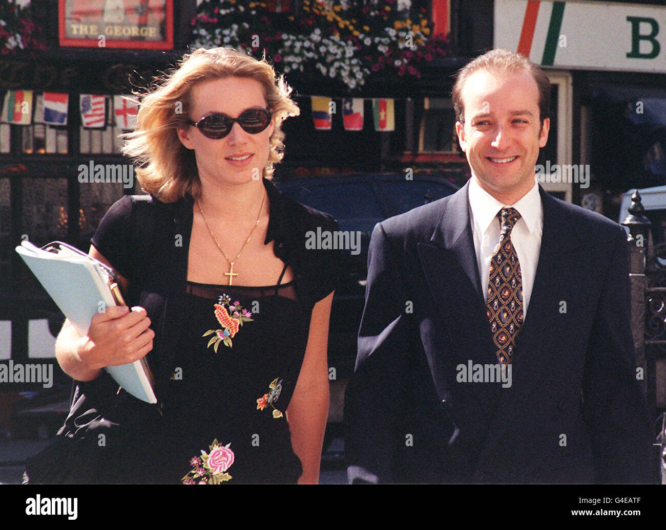 Stage hypnotist Paul McKenna arrives with his manager, Clare Staples ...