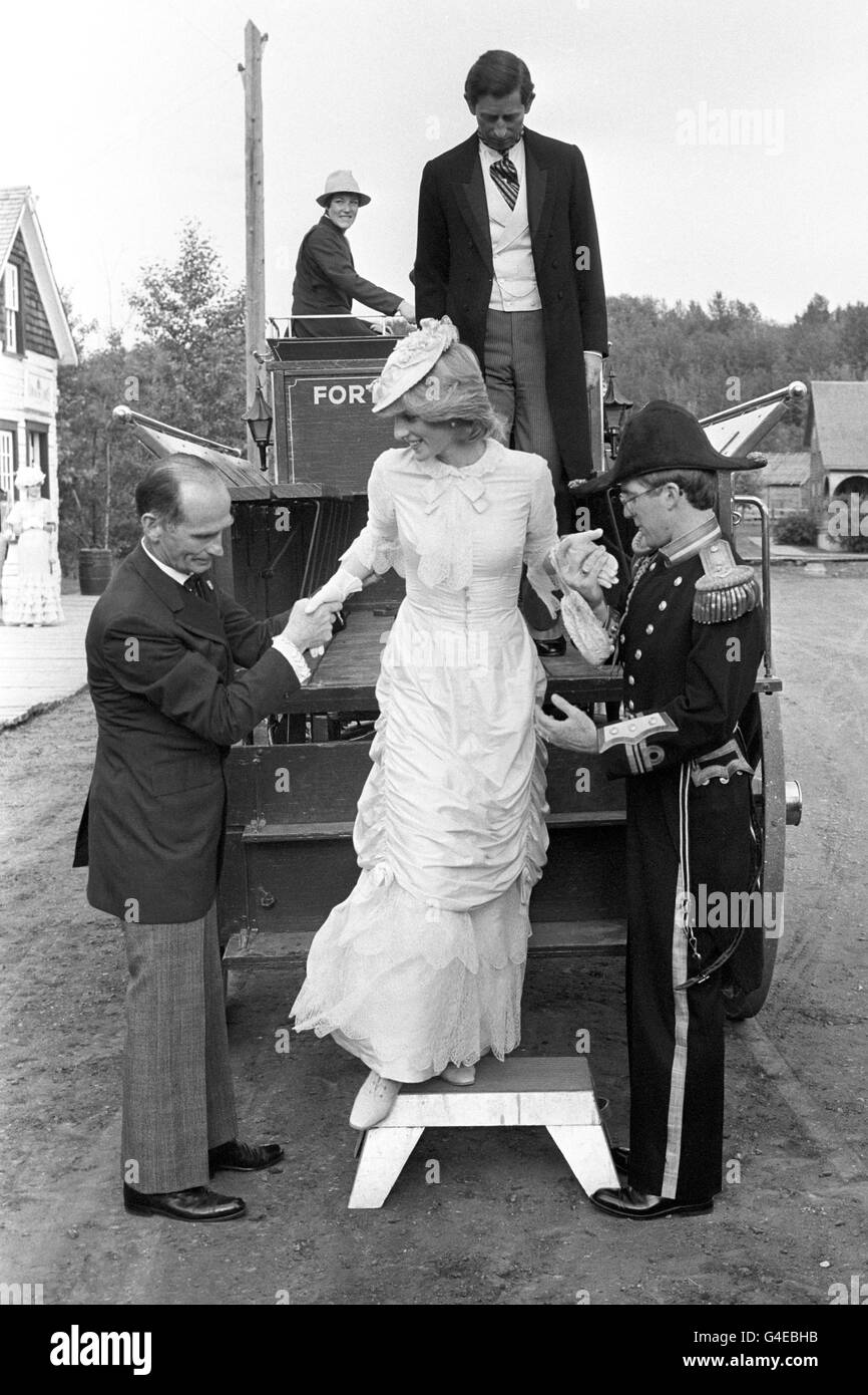 The Princess of Wales is given a helping hand as she steps from a ...