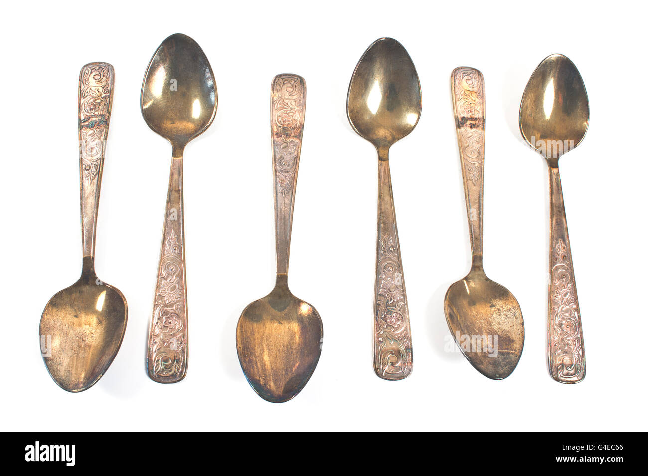 Vintage silver tea spoons isolated on white Stock Photo - Alamy