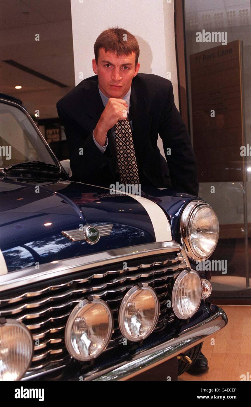 WBC Super-Middleweight champion Richie Woodhall poses next to a Mini ...