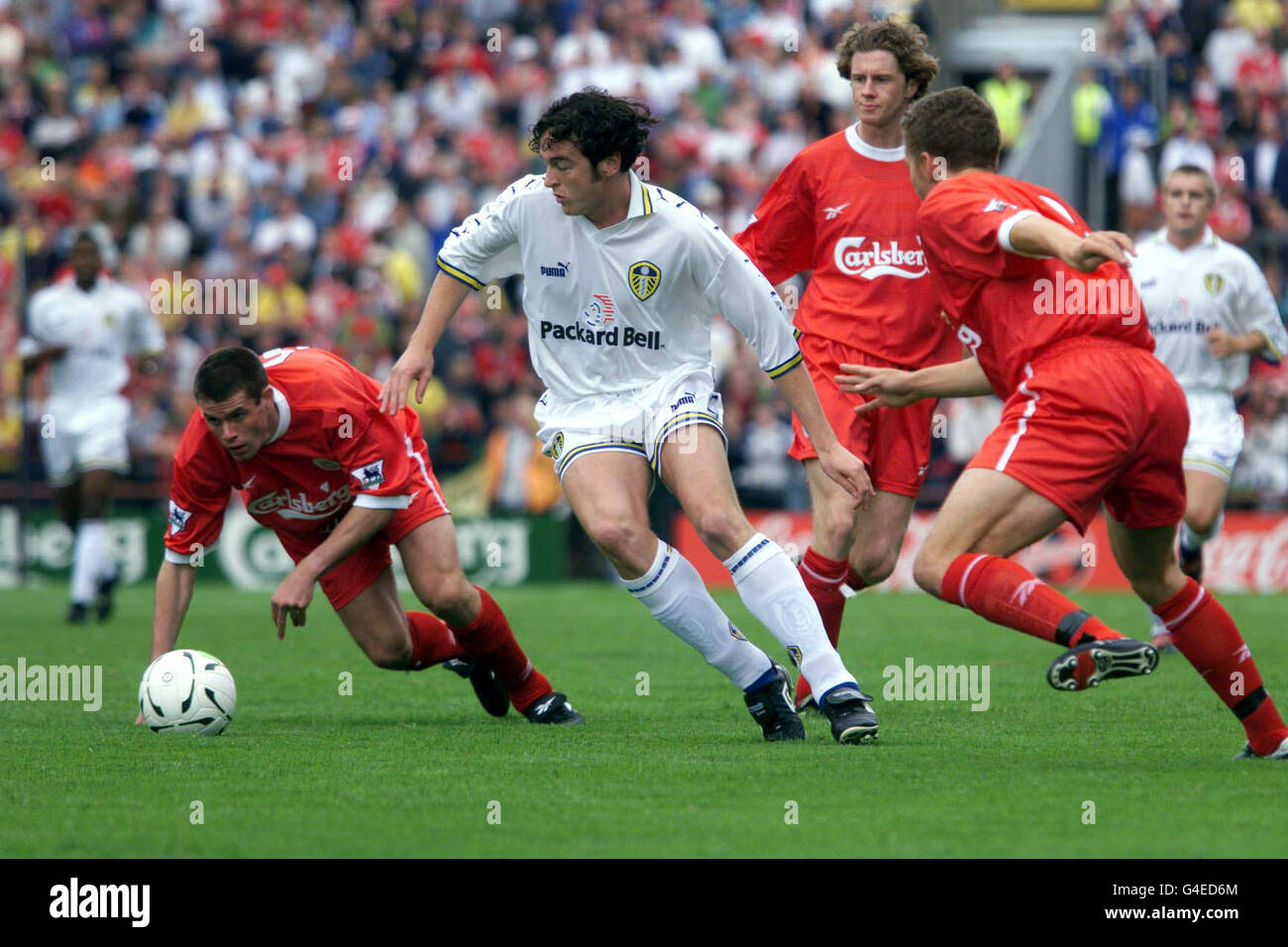 Leeds United's Lee Matthew's (centre) breaks through the Liverpool ...