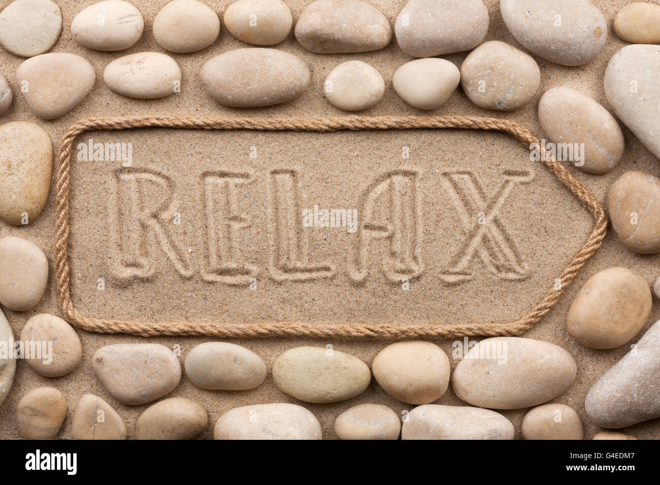 Pointer made of rope with an inscription relax, with white stone, on ...