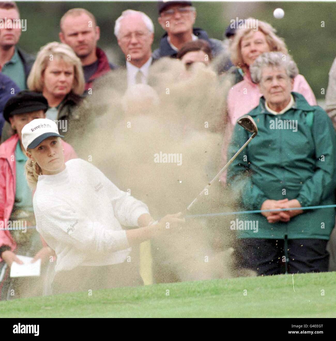Scotland's Janice Moodie, plays out of a bunker on the 1st green ...