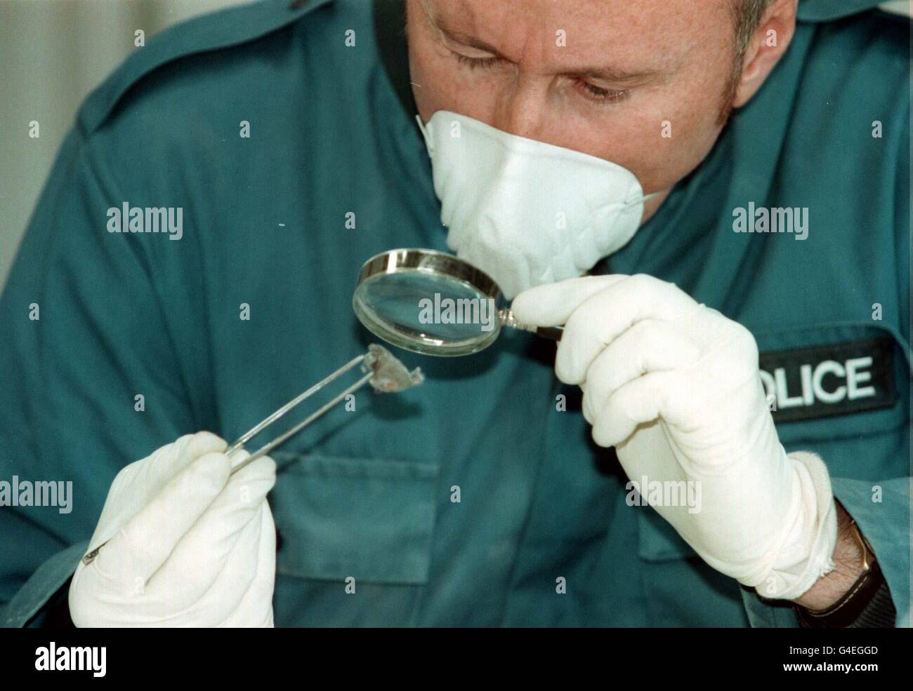 A member of the Omagh Metropolitan police forensic team, today ...