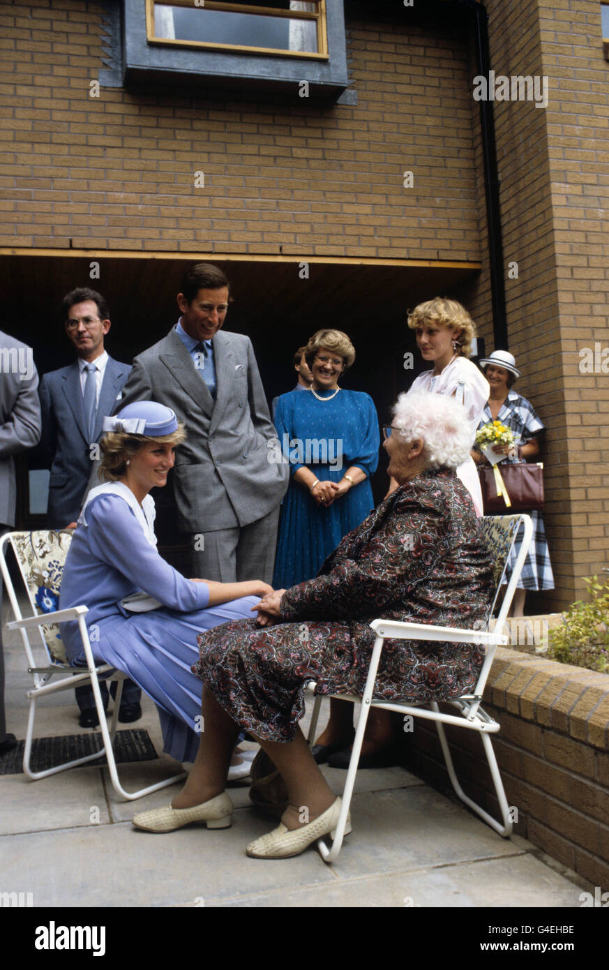 The Prince and Princess of Wales chat with Mrs Sally Salisbury (seated ...