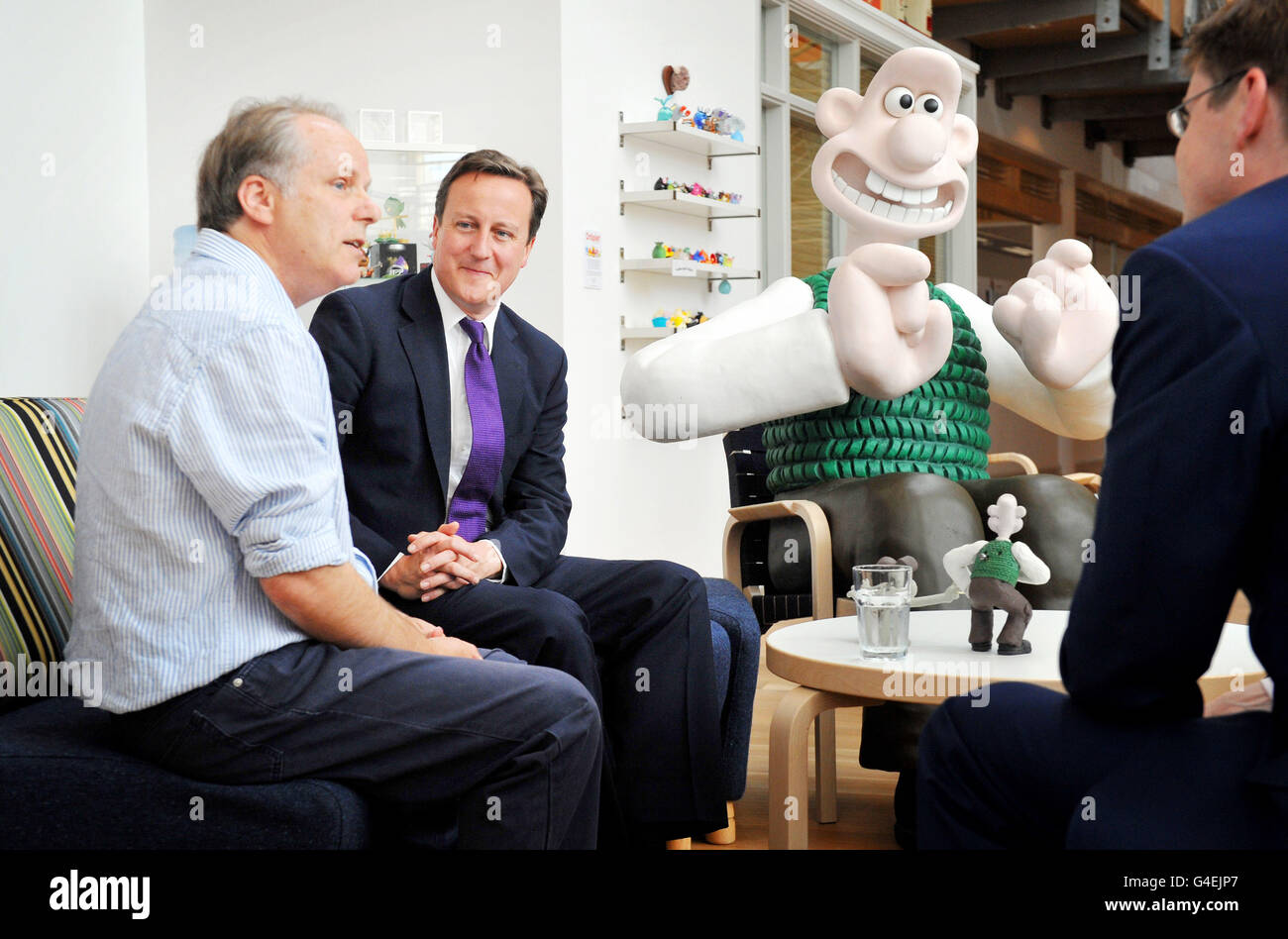 Prime Minister David Cameron speaks with animator Nick Park at the ...