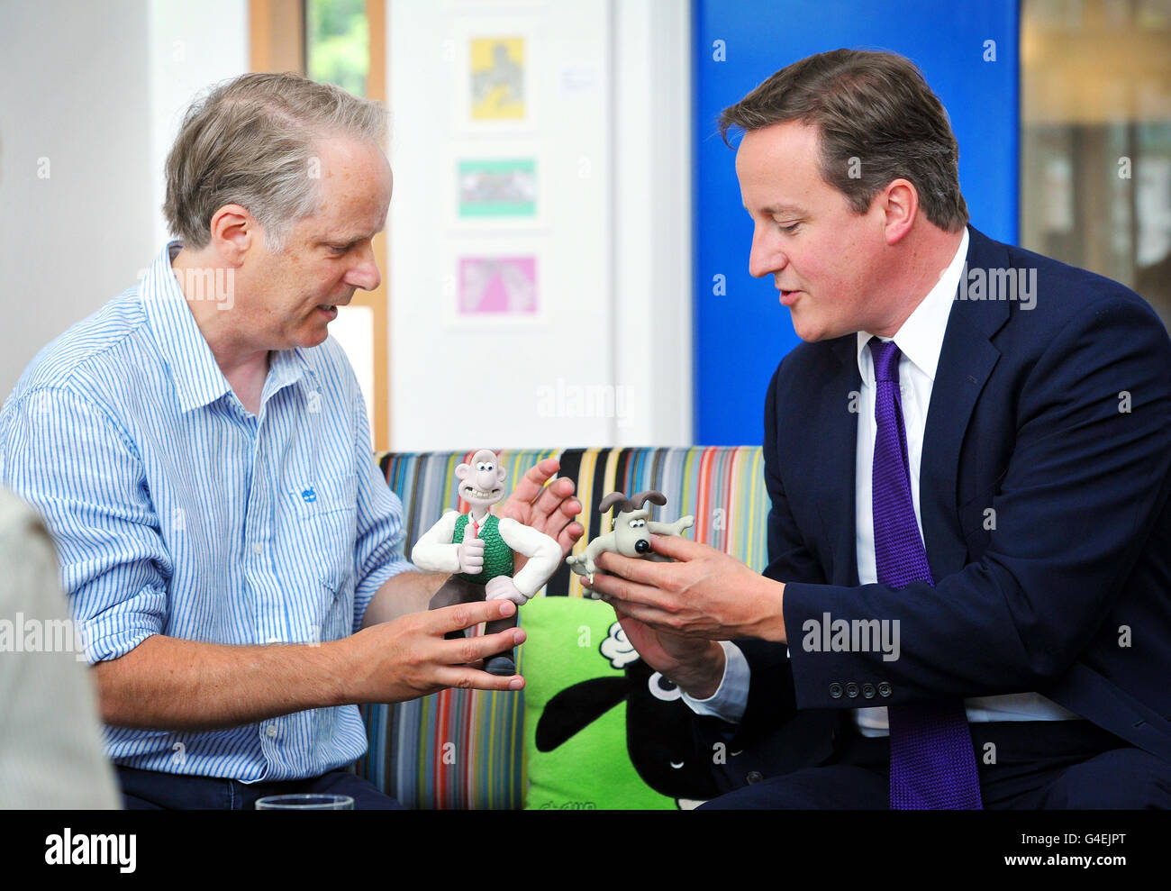 Prime Minister David Cameron speaks with animator Nick Park at the ...