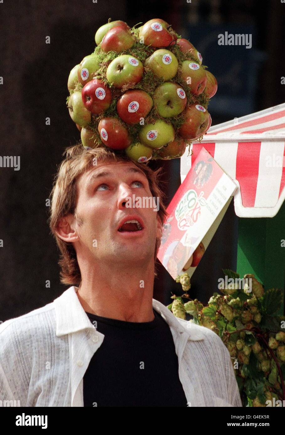 England and Arsenal football ace, Tony Adams, kicks off the start of ...