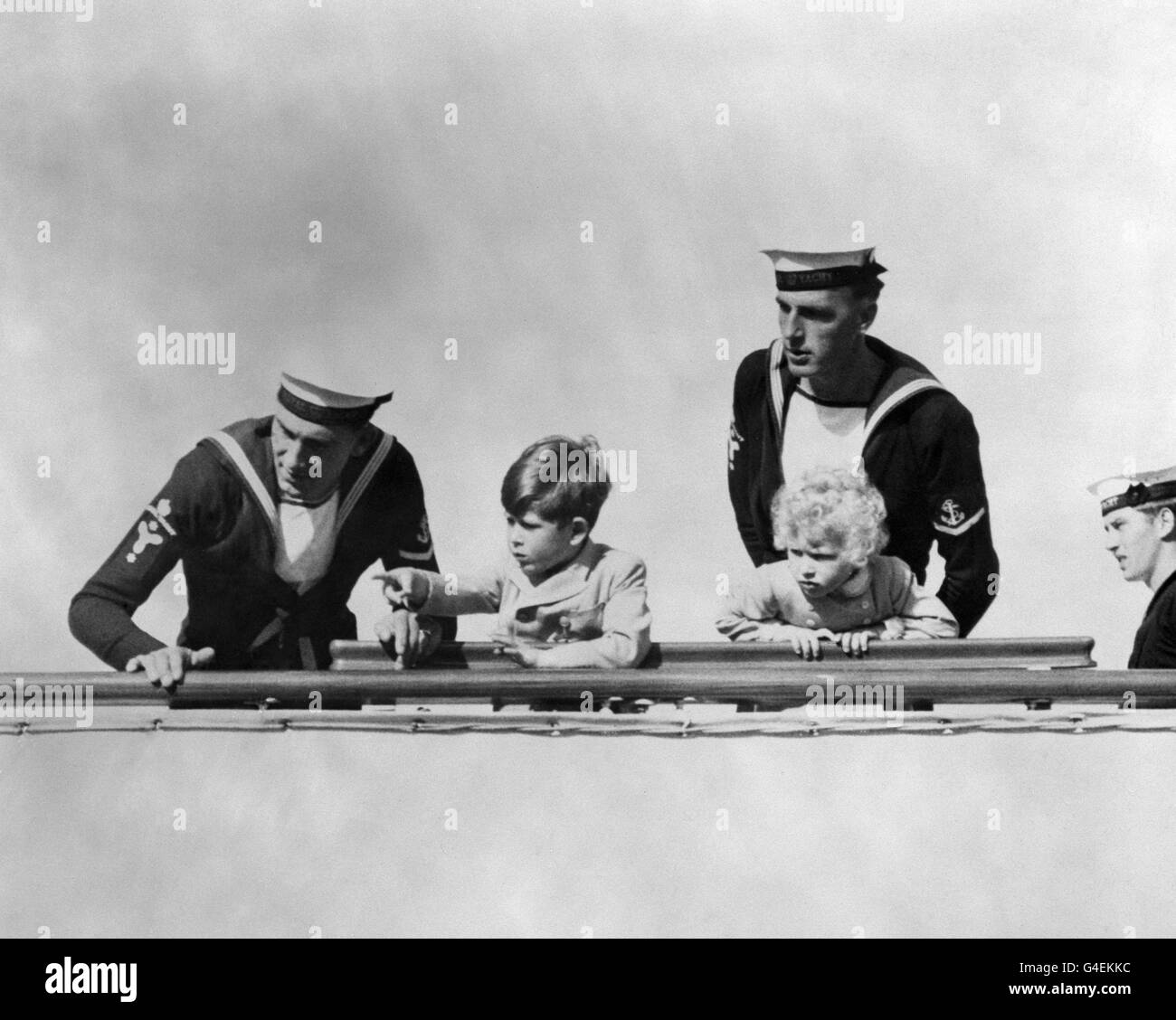 The Prince of Wales and Princess Anne, with two members of the royal ...