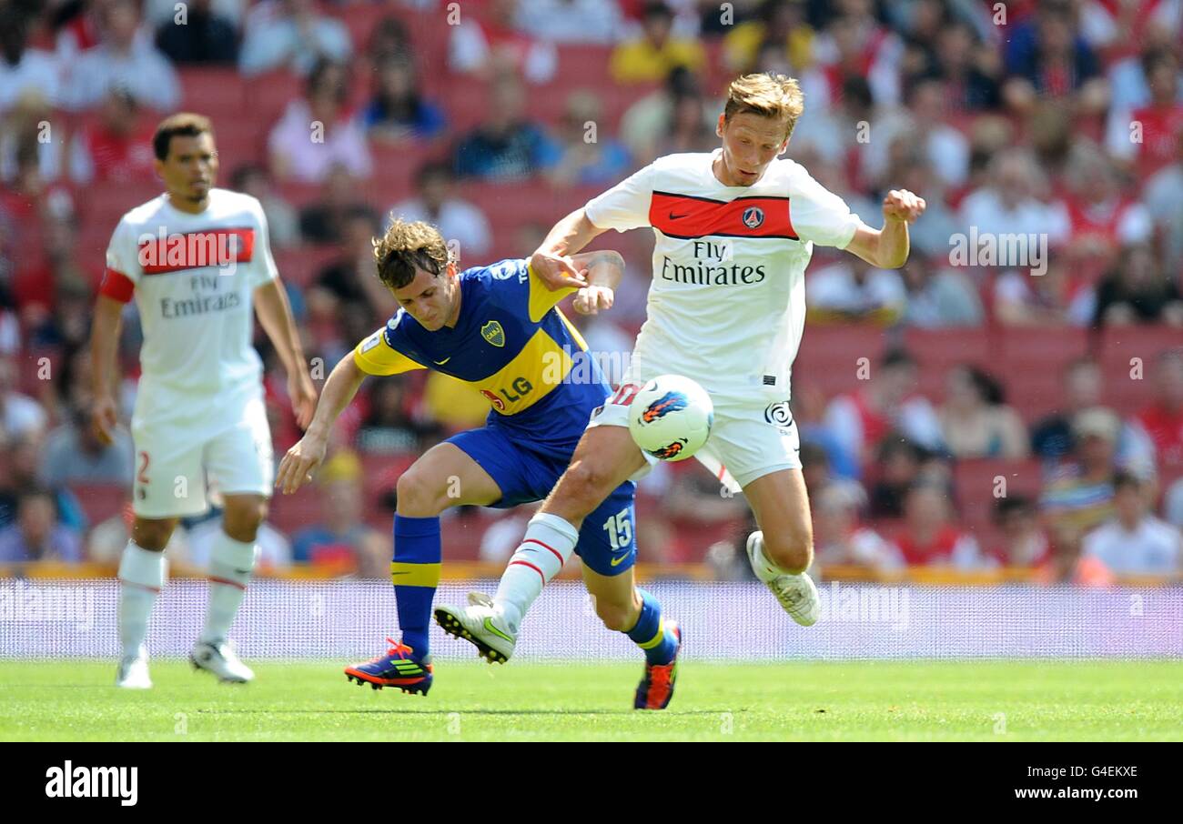 Boca Juniors' Nicolas Colazo (left) and Paris Saint-Germain's Clement ...