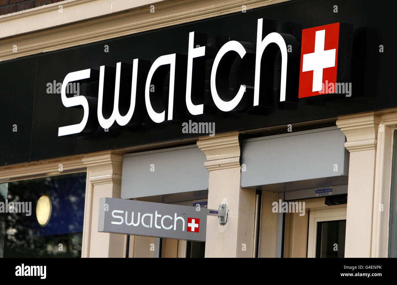 Stock Oxford Street. Swatch shop in London's Oxford Street Stock Photo ...