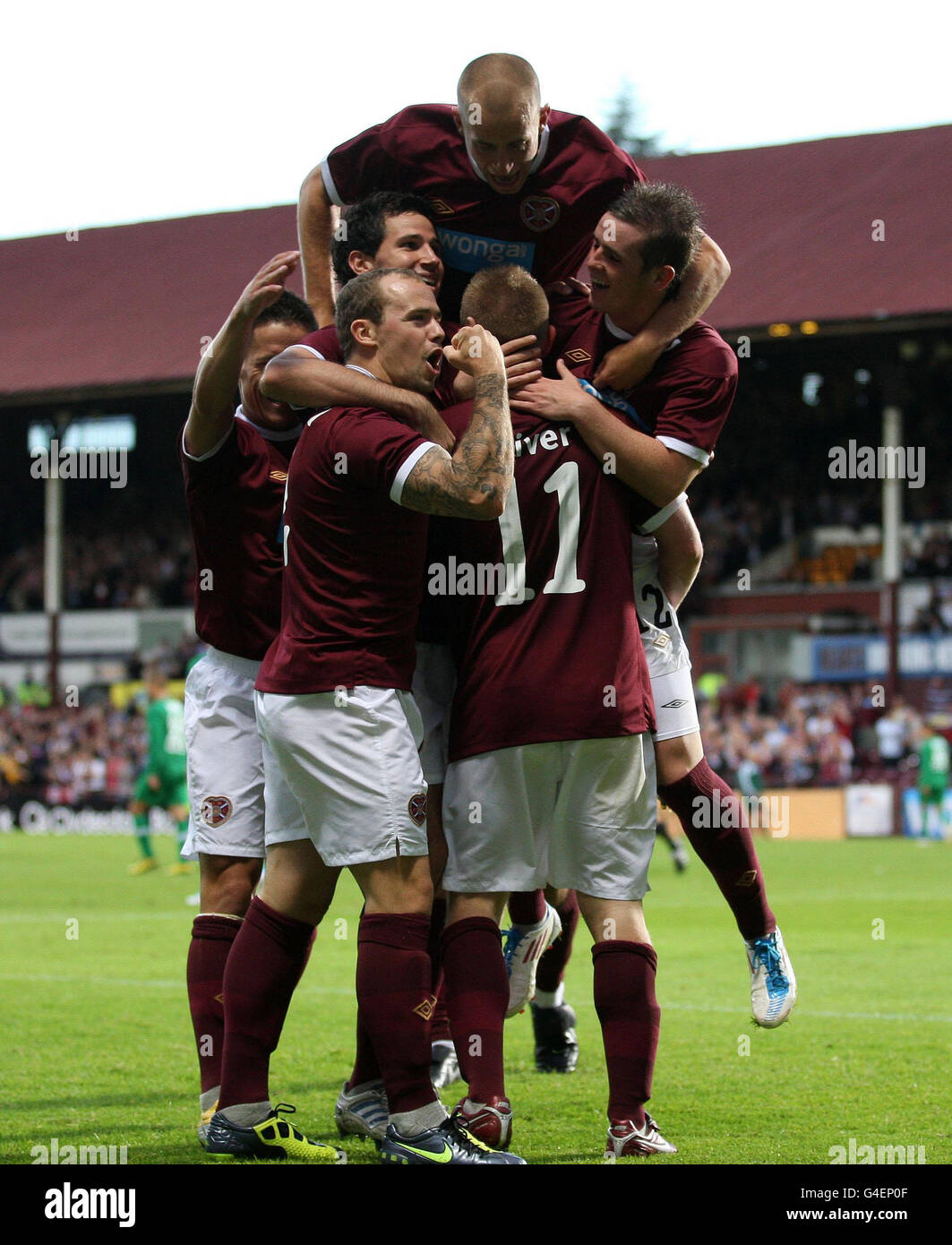 Heart's Andrew Driver (no.11) celebrates scoring the third goal during ...