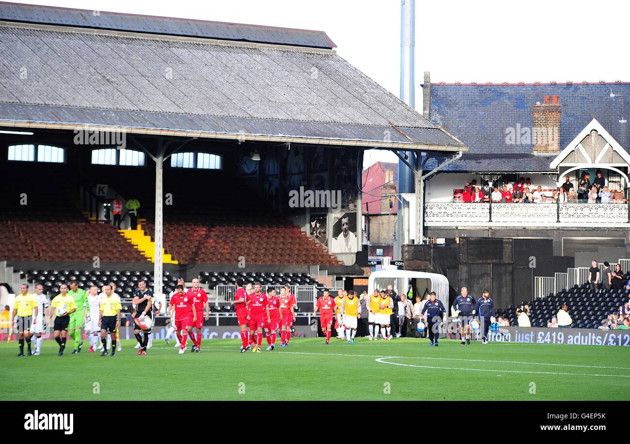 Players walk onto the pitch prior to kick off hi-res stock photography ...