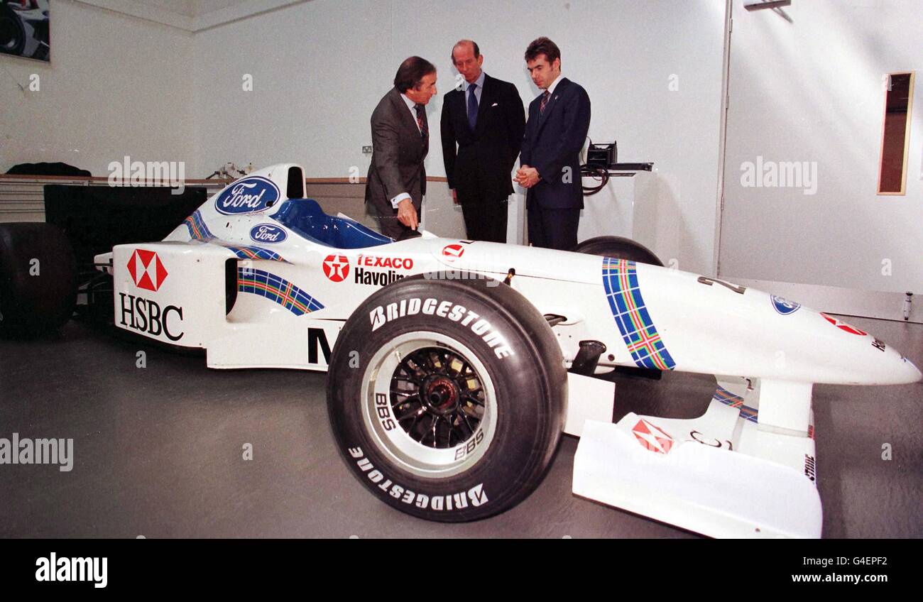 Former world motor racing champion Jackie stewart (Left) with his son ...