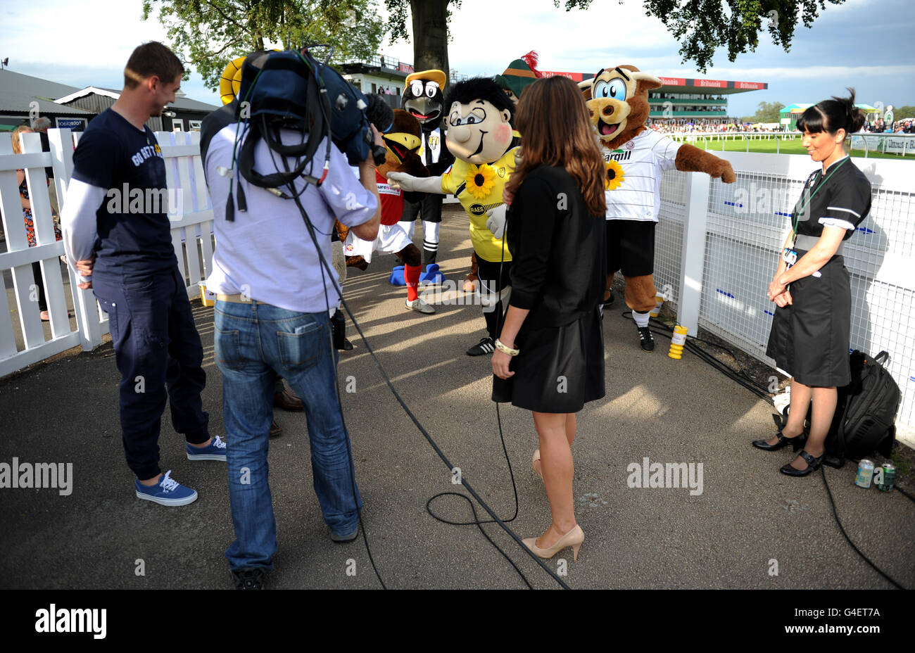 Burton Albion mascot Billy Brewer warm up with other mascots in the ...