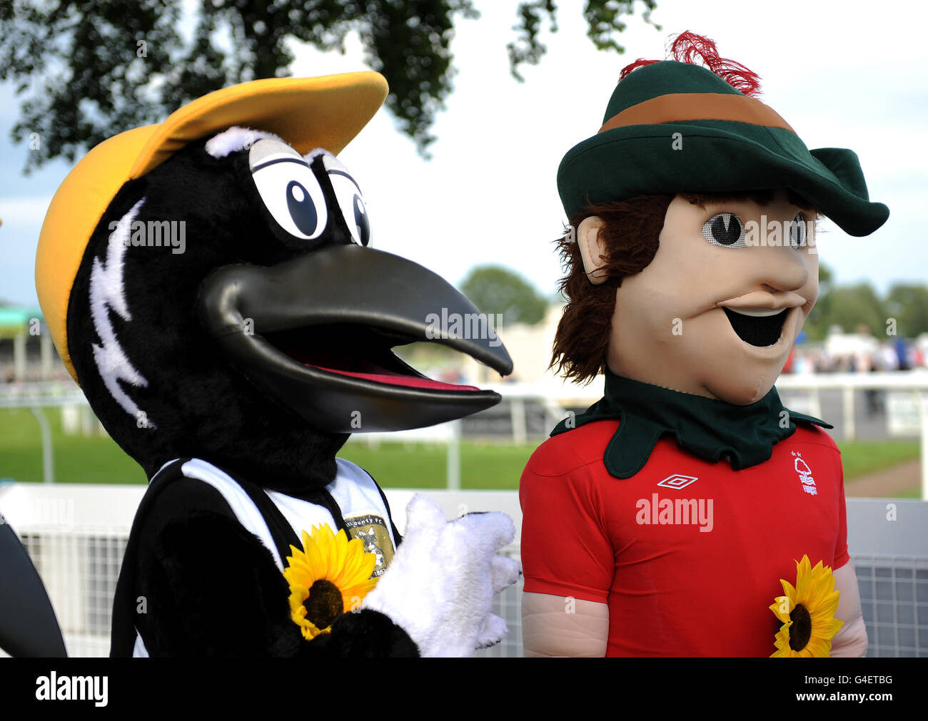 Notts County mascot Mr Magpie (left) and Nottingham Forest mascot Robin ...