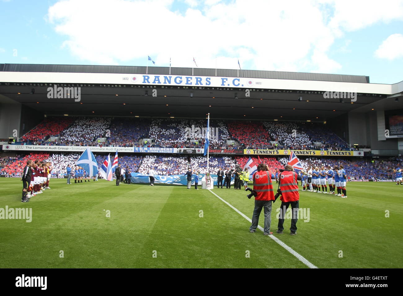 Craig Whyte, Rangers owner and Chairman unfurls the League flag ahead ...