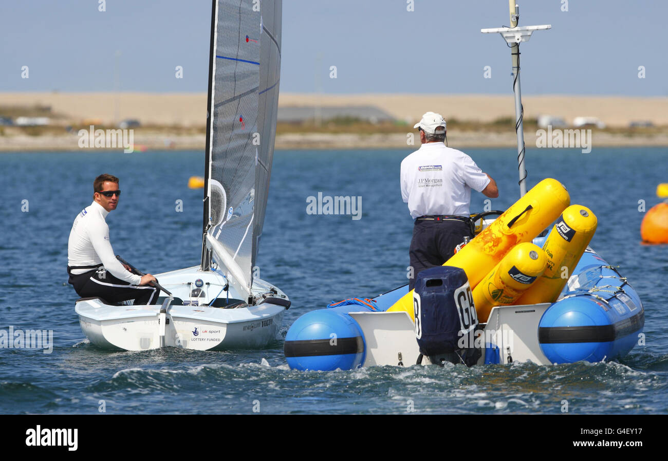 British Olympic Finn sailor and triple gold medallist Ben Ainslie (left ...