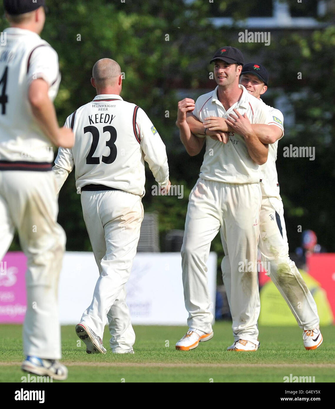 Lancashires Tom Smith celebrates catching Warwickshires Chris Woakes ...