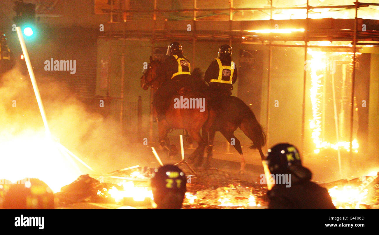 Mounted police patrol the streets in Tottenham, north London as fire ...