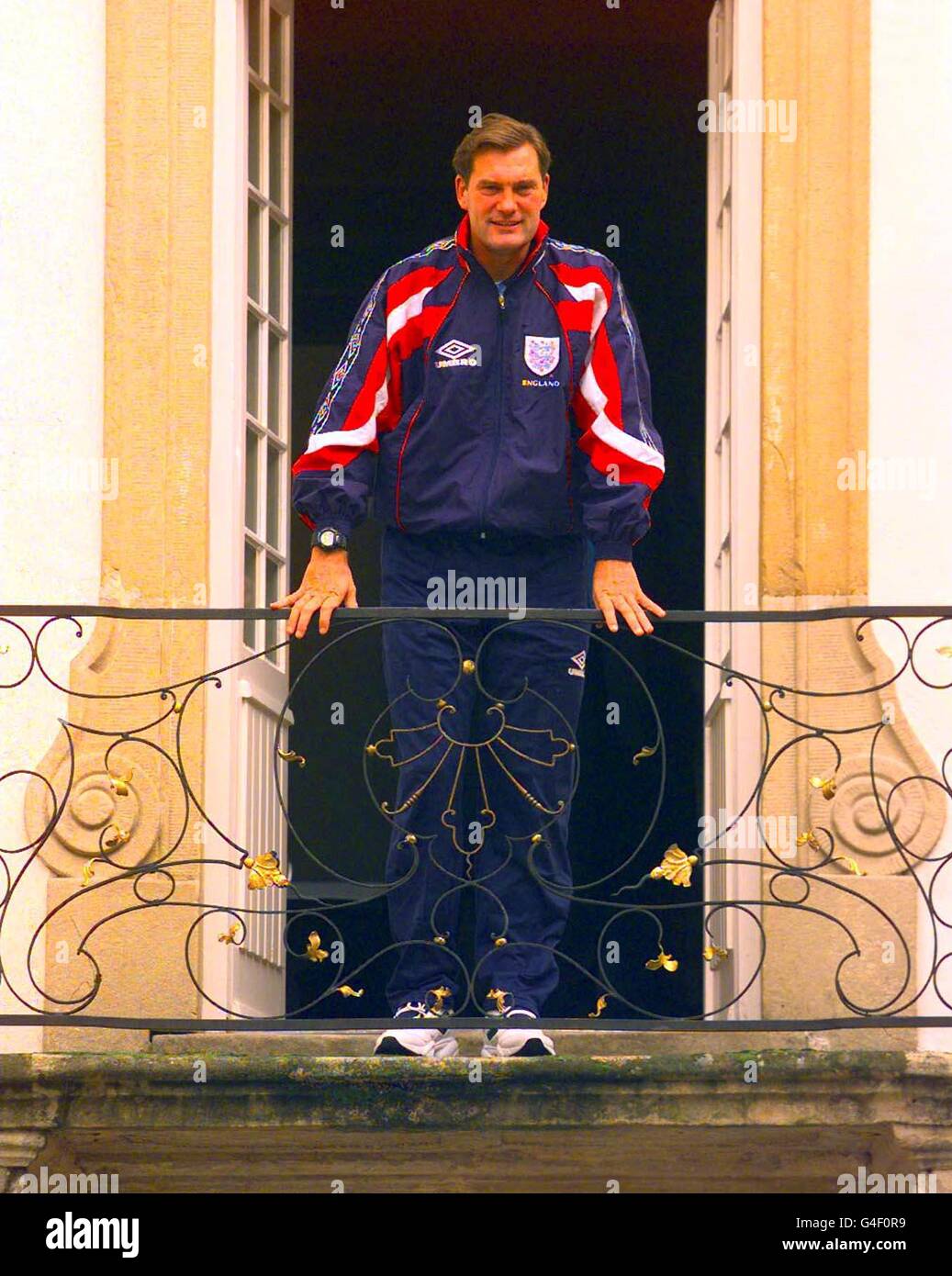England soccer coach Glenn Hoddle looks out of the window of the ...