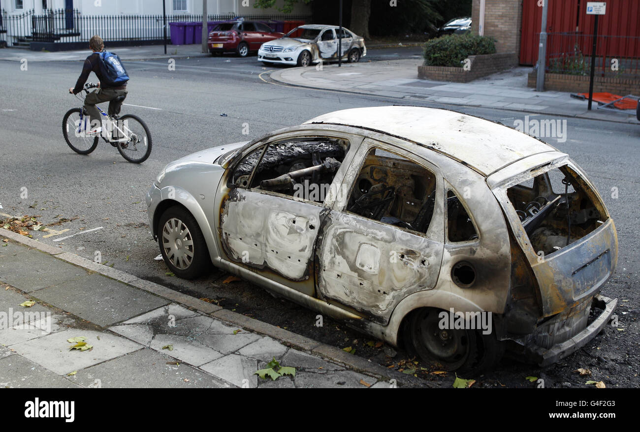 Burnt out cars in Grove Street in the Toxteth area of Liverpool, after ...