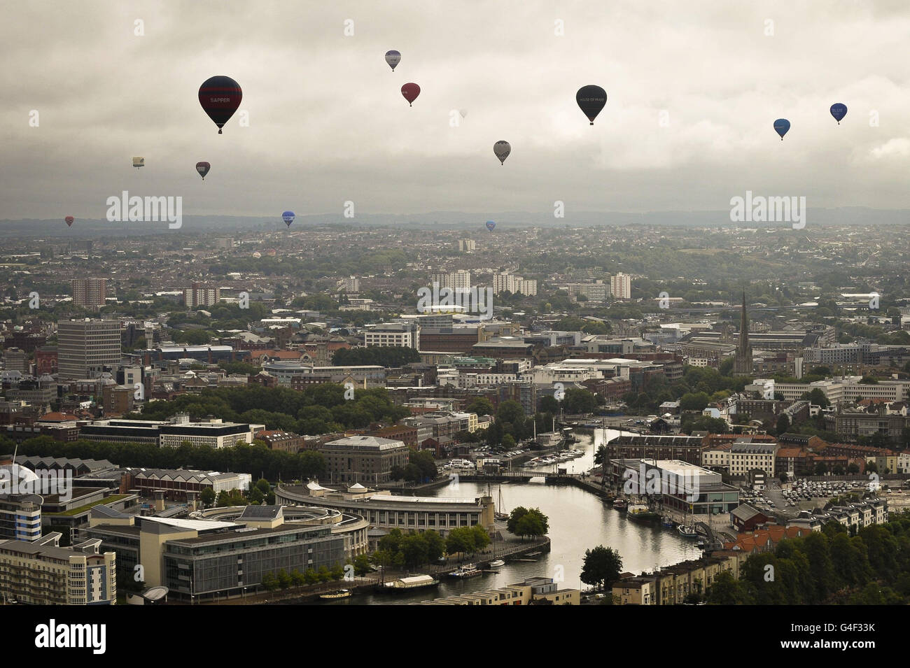 Hot air balloons float over the city of Bristol as over 60 balloons ...