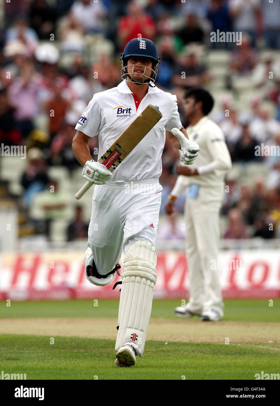 England's Alastair Cook runs in for his double century during the ...