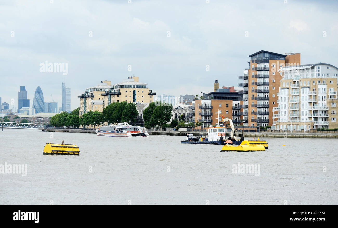 A crane and life raft sit above a tug which sank this morning on the ...