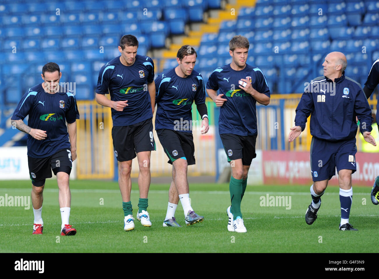 Coventry City players warming up before the match with Coventry City ...