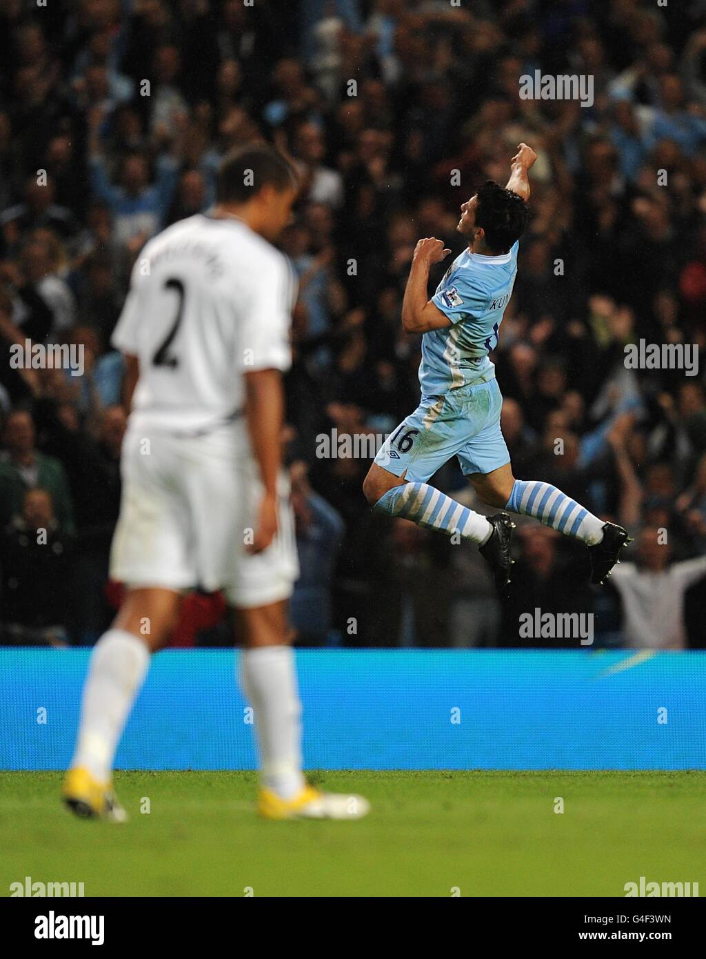 Manchester Citys Sergio Aguero Right Celebrates Scoring His Second
