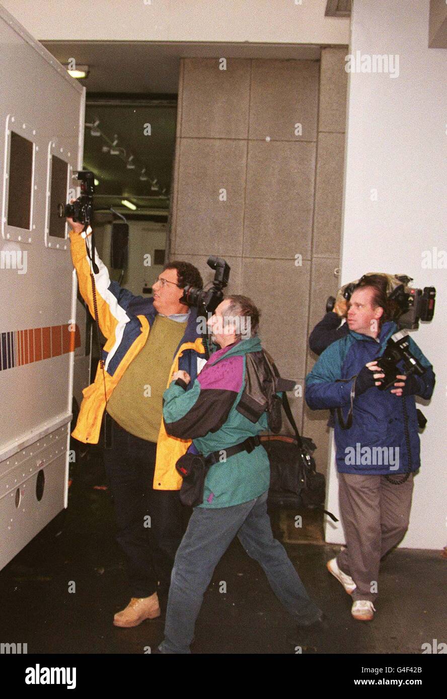 A police van attracts media attention at Camberwell magistrates court ...