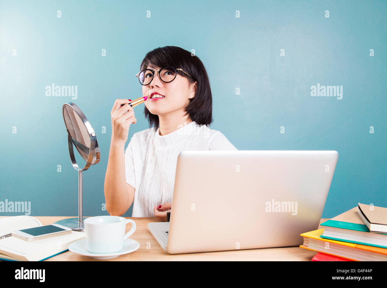 Young asian women make up with workspace table Stock Photo - Alamy