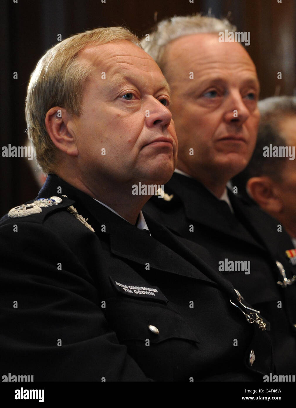 Acting Metropolitan Police Commissioner Tim Godwin (left) and Sir Hugh ...