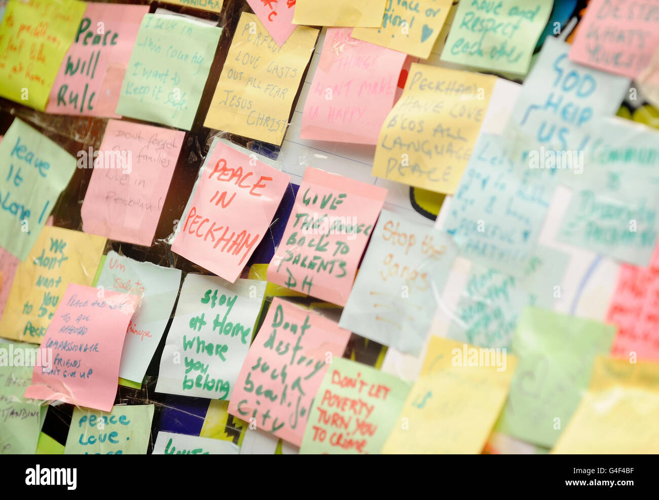 Post it notes bearing messages from residents in the window of ...
