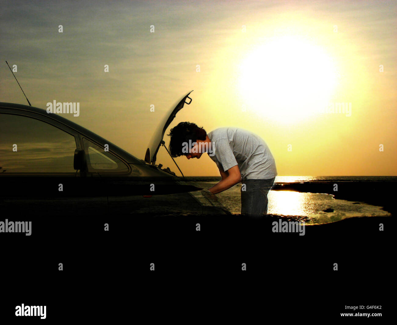 A car MEchanic checking hsi car Stock Photo - Alamy