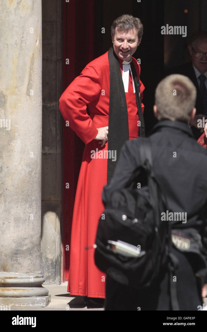 Reverend Neil Gardner talks to some of the those departing his Sunday ...