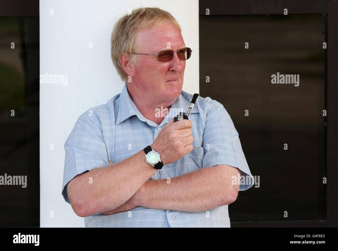 Cynlais Mullany, father of Ben Mullany smokes a pipe outside Antigua ...